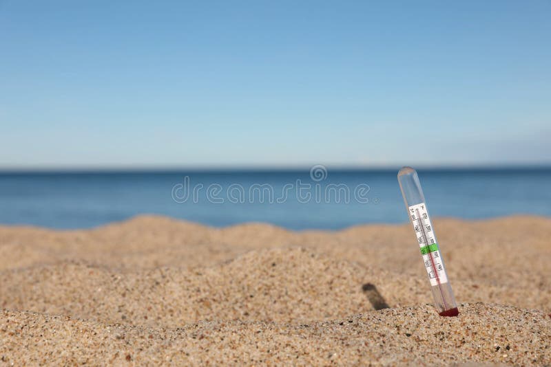 Weather Thermometer in Sand Near Sea, Space for Text Stock Image ...
