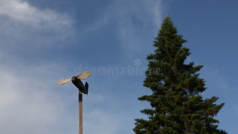 Weather Vane in Shape of Wooden Airplane with Rotating Propeller Stock ...