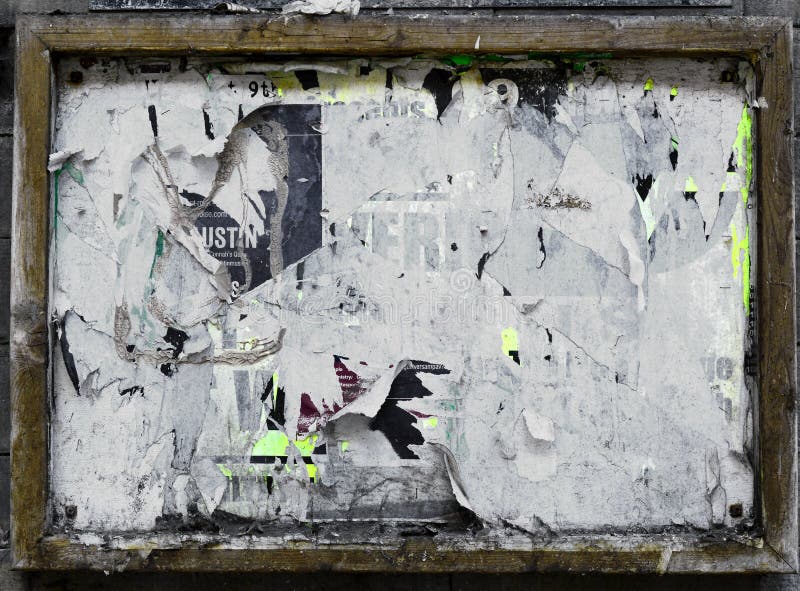 A Weathered Advertising Frame with Layers of Torn Posters Stock Image ...