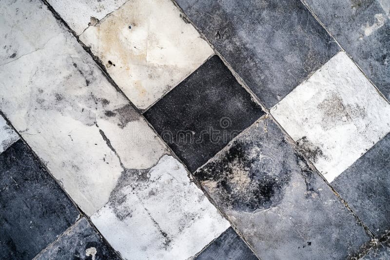 Weathered Black and White Checkerboard Pattern on Aged Concrete Surface ...