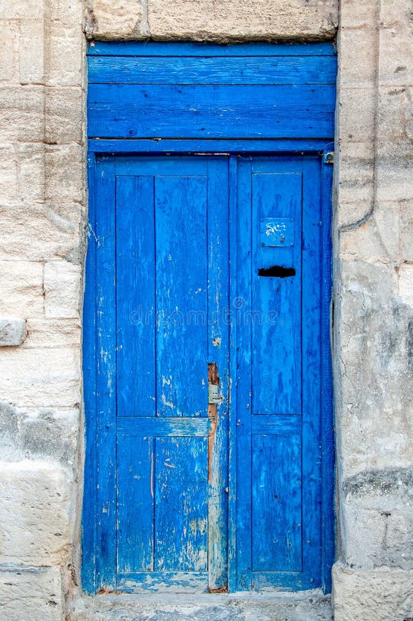 A Weathered Blue Door. the Texture of Old Door, Which the Old Pa Stock ...