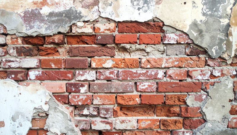 A Weathered Brick Wall Features a Mix of Red and Brown Bricks Stock ...