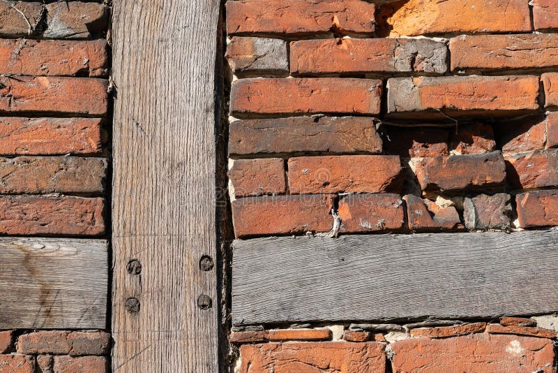 Weathered Brick Wall with Wooden Beams in Rustic Architecture Stock ...