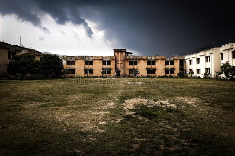 Weathered Building Amidst Open Grounds Stock Image - Image of open ...