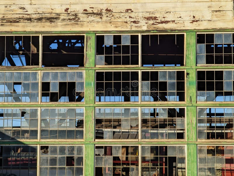Old Warehouse with Lots of Broken Window Panes Stock Image - Image of ...