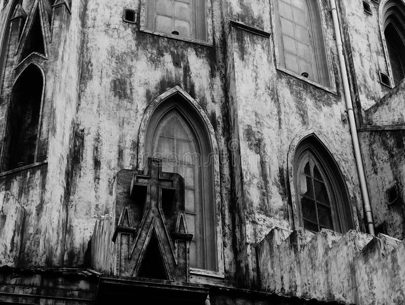 Weathered Church Facade with Gothic Cross. Stock Photo - Image of ...