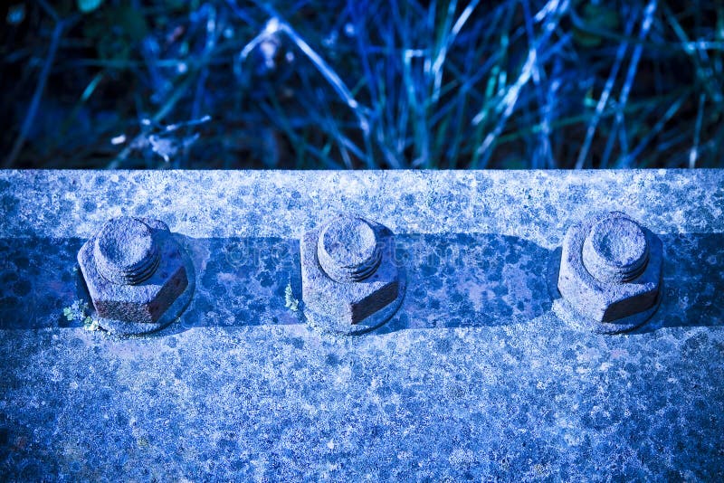 Weathered and Decaying Metal Framework with Rust-encrusted Bolts and ...