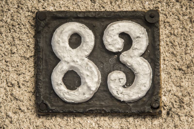 Weathered Enameled Plate Number 83 Stock Photo - Image of city, blue ...