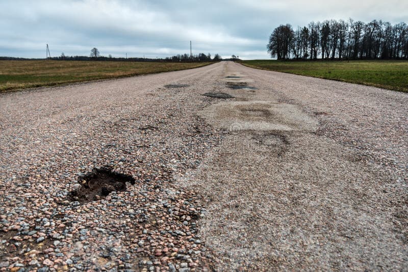 Weathered hole on road stock photo. Image of road, damage - 201676962
