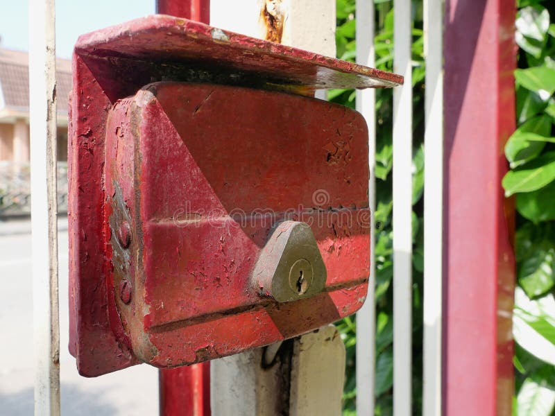 Weathered iron gate lock stock image. Image of iron - 393598335
