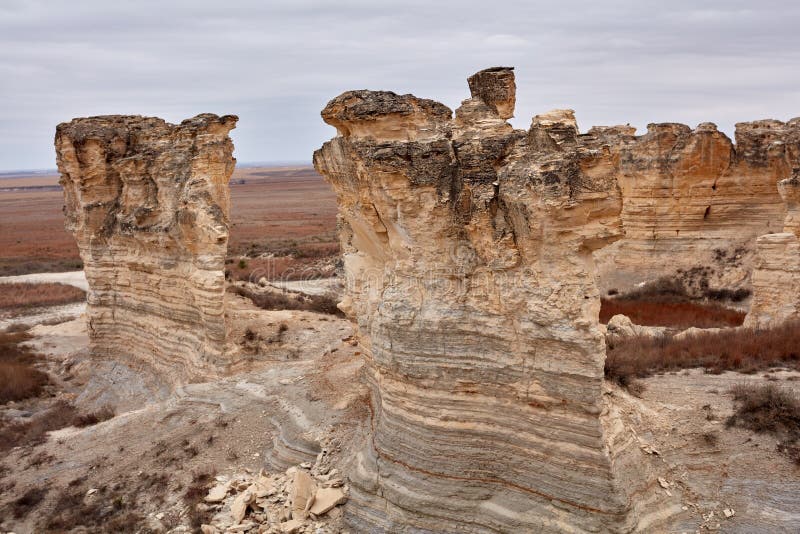 Weathered Limestone Pillars and Vertical Rock Face Stock Image - Image ...
