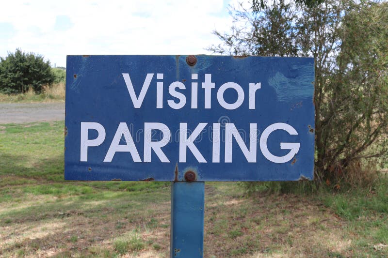 Weathered Metal Blue and White Visitor Parking Sign Stock Photo - Image ...