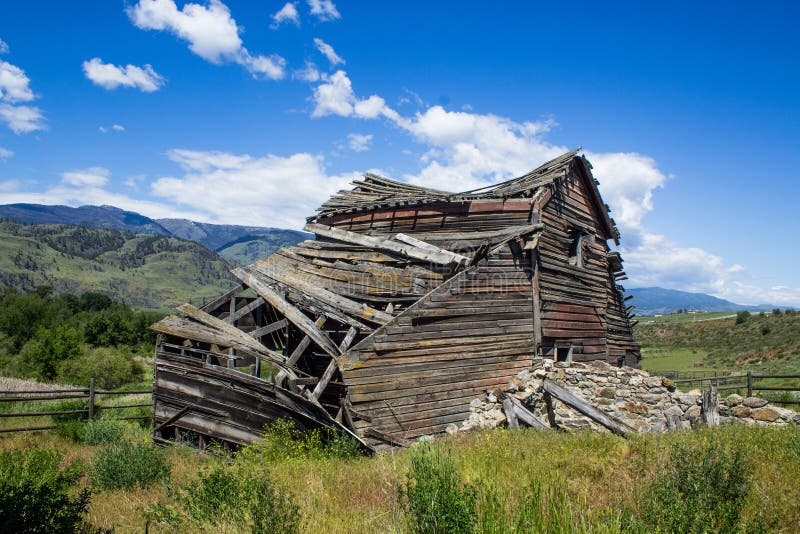 Weathered Old Barn Collapsing Under a Blue Sky Stock Image - Image of ...