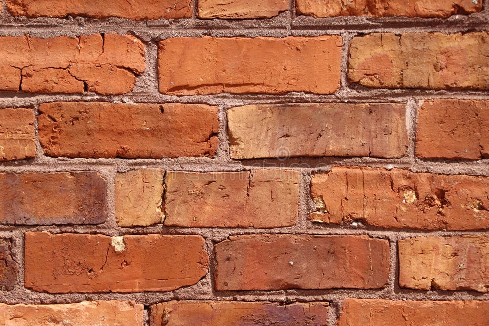 Weathered Orange Red Brick Wall with Pink Mortar in Sun Detail Stock ...