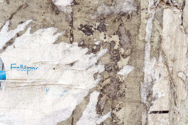 Weathered Paper Texture on Wall Showcasing Layers of Peeling Graphics ...