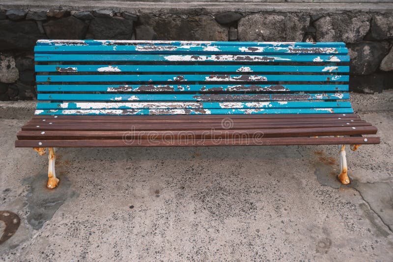 Weathered park bench stock photo. Image of concrete - 339906886