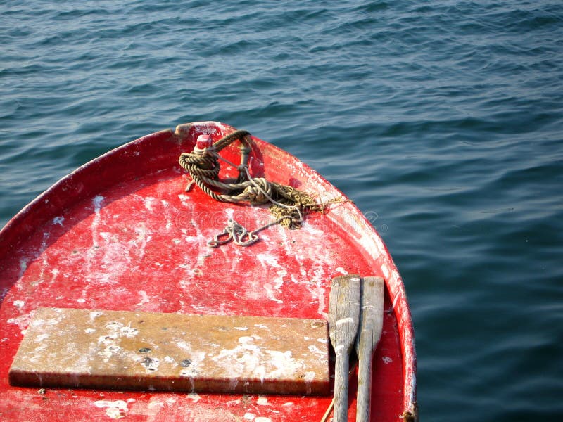 Weathered red rowing boat stock photo. Image of ocean - 11325114