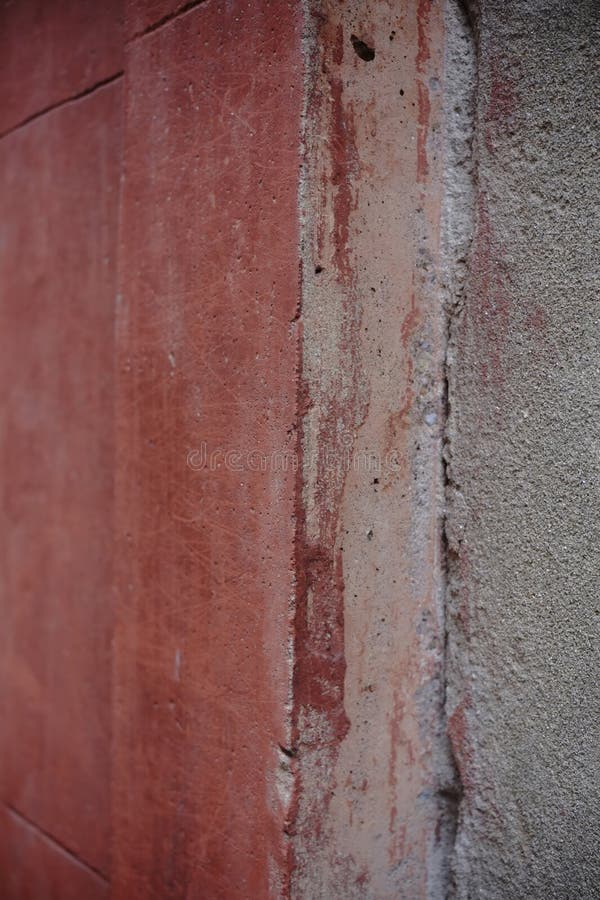 Close Up of a Red Painted Wall with Visible Cracks and Deterioration ...