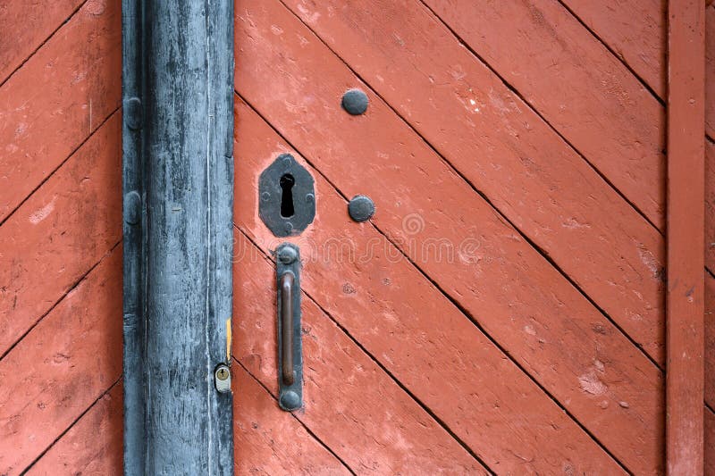 Weathered Red Wood Door with Old Iron Lock and Handle Stock Photo ...