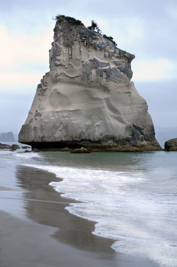 Weathered rock and waves stock image. Image of abstract - 13952783