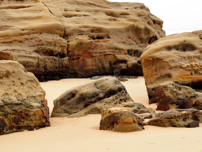 Weathered Rocks on Beach stock image. Image of rocks - 51315541