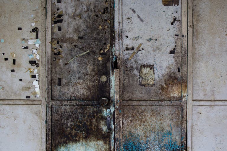 Weathered Rustic Metal Doors with Peeling Paint. Stock Image - Image of ...
