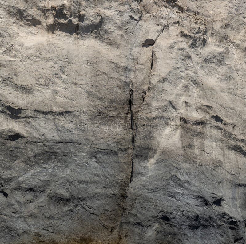 Weathered Seaside Rock Face Texture. Aged Volcanic Stone Wall Surface ...