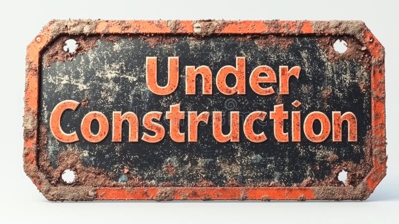 A Weathered Sign Displaying Under Construction on a Textured Backdrop ...