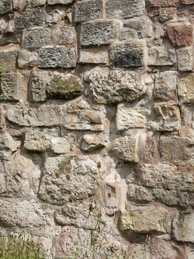 A Weathered Stone Wall with Differing Size Cut Stone. Stock Image ...