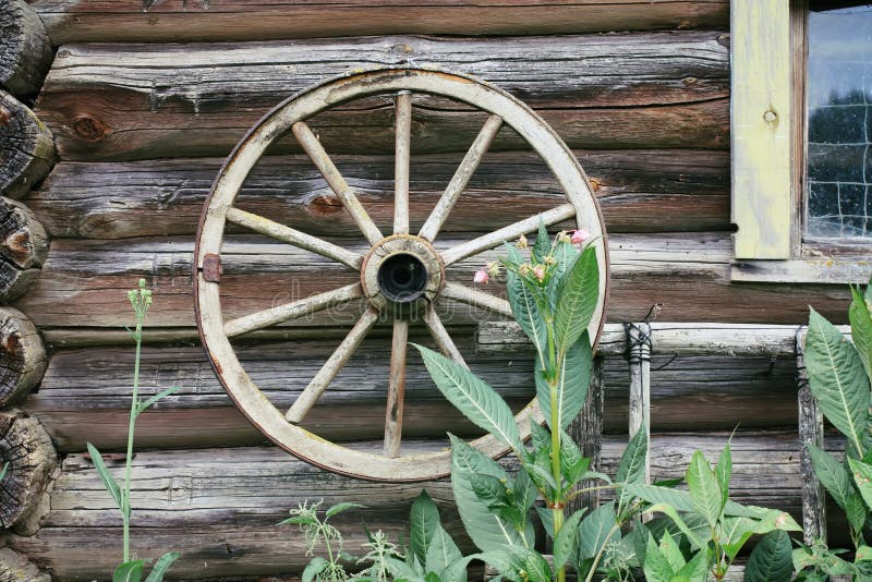 Weathered Wall of Old Barn with Wood Wheel. Stock Photo - Image of ...