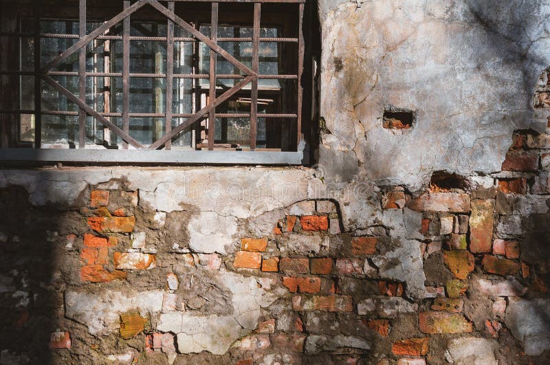 Weathered Wall with Peeling Paint, Bricks and Rust Stains Creates a ...