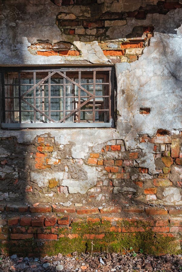 Weathered Wall with Peeling Paint, Bricks and Rust Stains Creates a ...