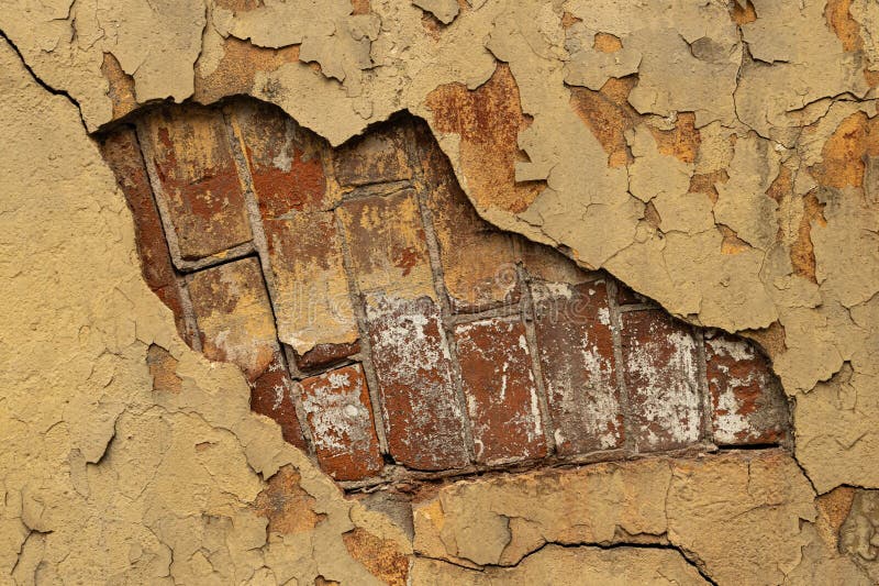 Weathered Wall Reveals Exposed Bricks in a Textured Display of Peeling ...