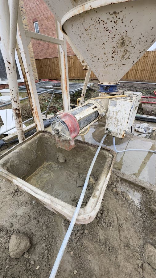 Concrete Pump and Slurry Trough at Construction Site Stock Image ...