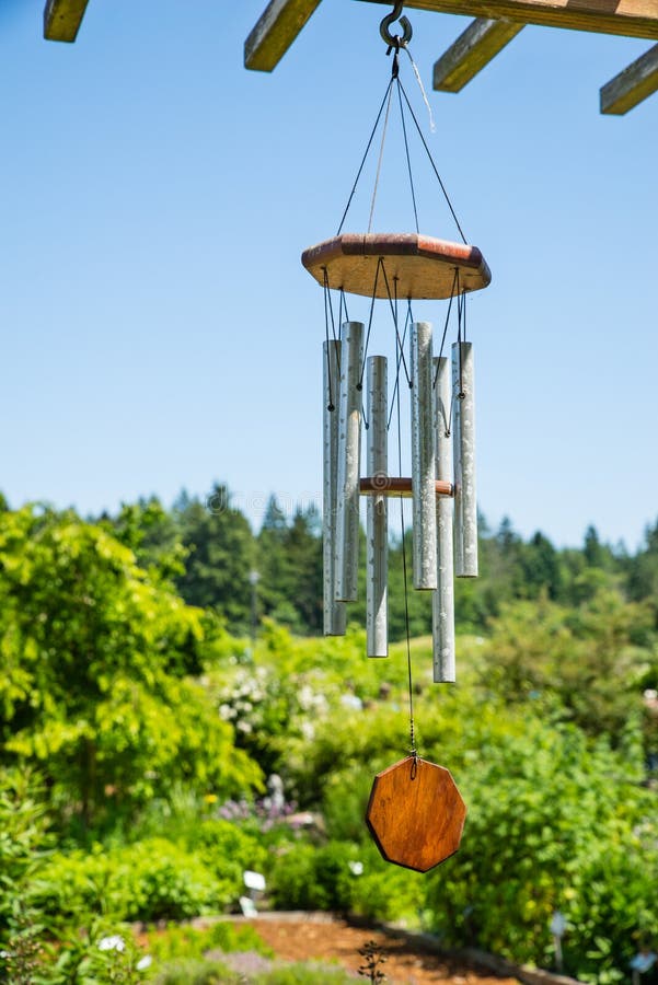 Weathered Wind Chime in the Sun Stock Photo - Image of nature, hanging ...