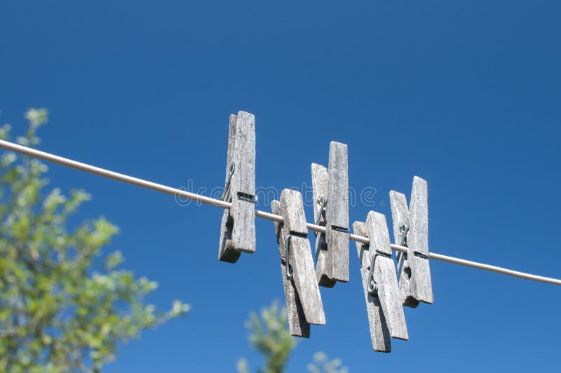 Two Clamps for Laundry Hanging on a String Stock Image - Image of ...