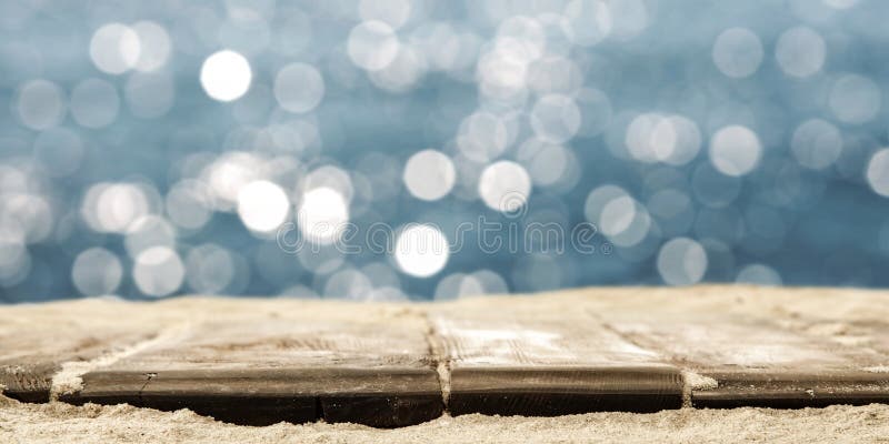 Weathered Wooden Surface Slightly Covered with Sand and Blurred Sea ...