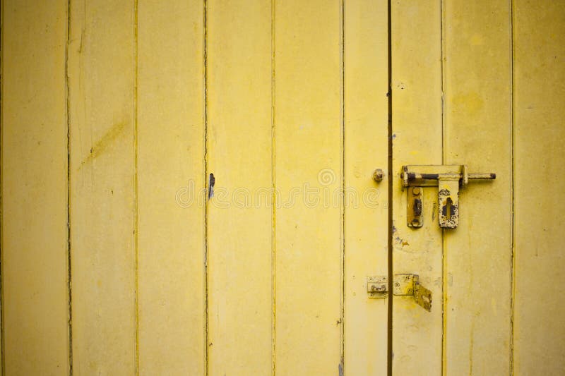 Weathered Yellow Door with a Open Latch Stock Image - Image of entrance ...