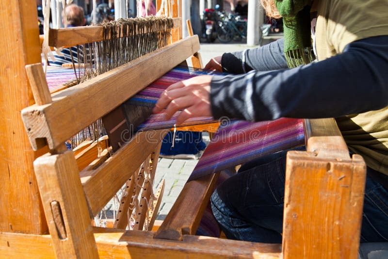 Weaver weaves a cloth stock image. Image of cloth, textile - 35474987