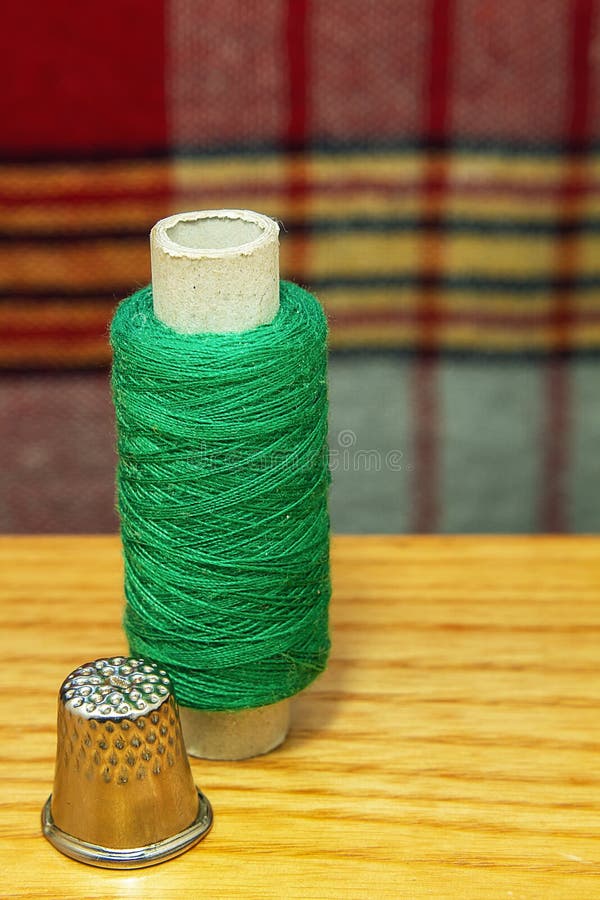 Weaving art. Green thread stock image. Image of thread - 142355343