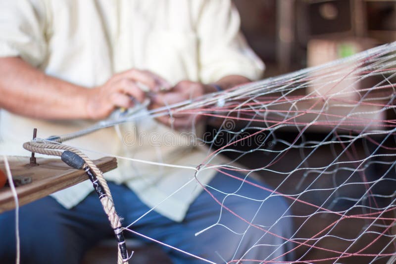 Weaving fishing net stock image. Image of person, fishing - 35968837