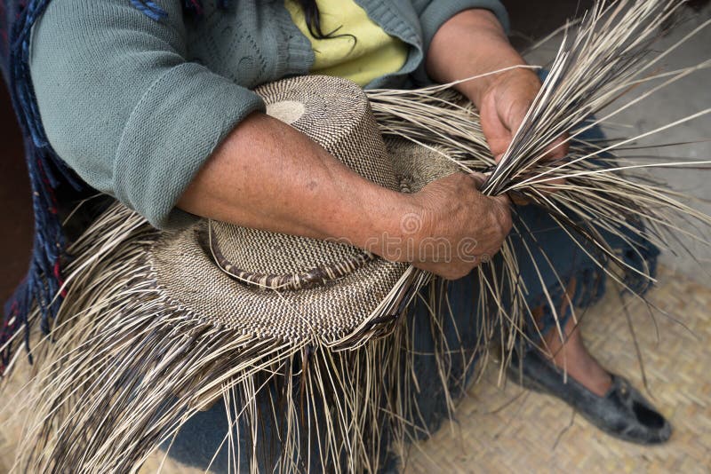 Weaving a straw hat stock photo. Image of female, woman - 83261728