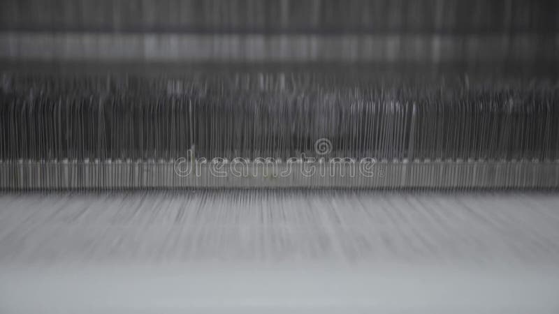 Weaving Threads Machine, Working Automatically at a Fabric Factory ...