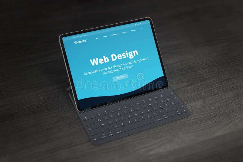 Web Design Studio Promo Web Site on Tablet with Keyboard on Office Desk ...