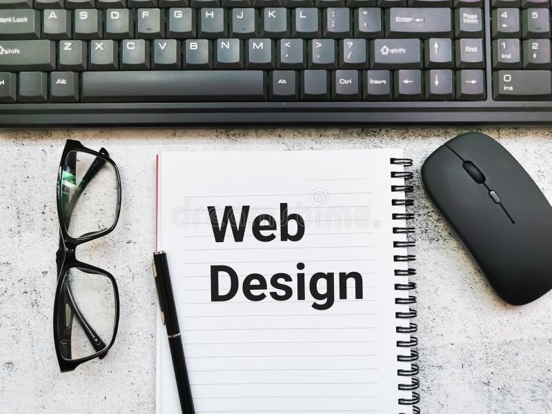 Web Design Written on Note Book with a Pen,wireless Mouse,keyboard and ...