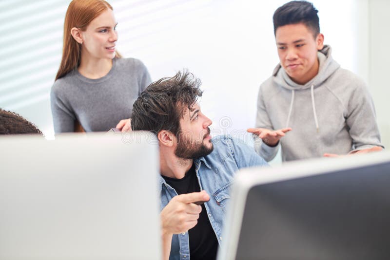 Web Designer Team Discusses Design Idea Stock Photo - Image of internet ...