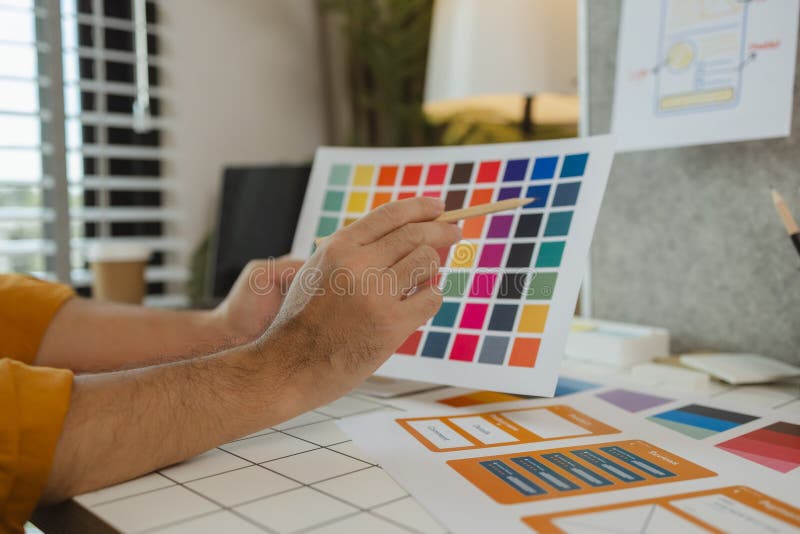 A Web Designer is Using His Idea To Create a Digital Product Design ...