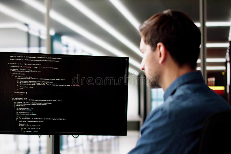 Web Developer Looking at Code Stock Photo - Image of monitor, business ...