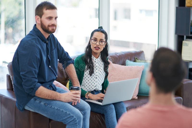 Web Developers Doing What they Do Best. a Group of Young Businesspeople ...