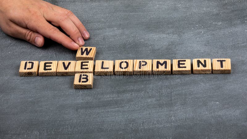 Web Development Concept. Wooden Alphabet Letters on a Black Chalk Board ...